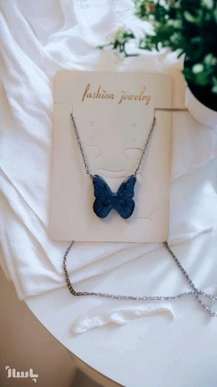 خرید و قیمت گردنبند رزینی با اتصالات تمام استیل مدل پروانه کد 1863602 | ترب